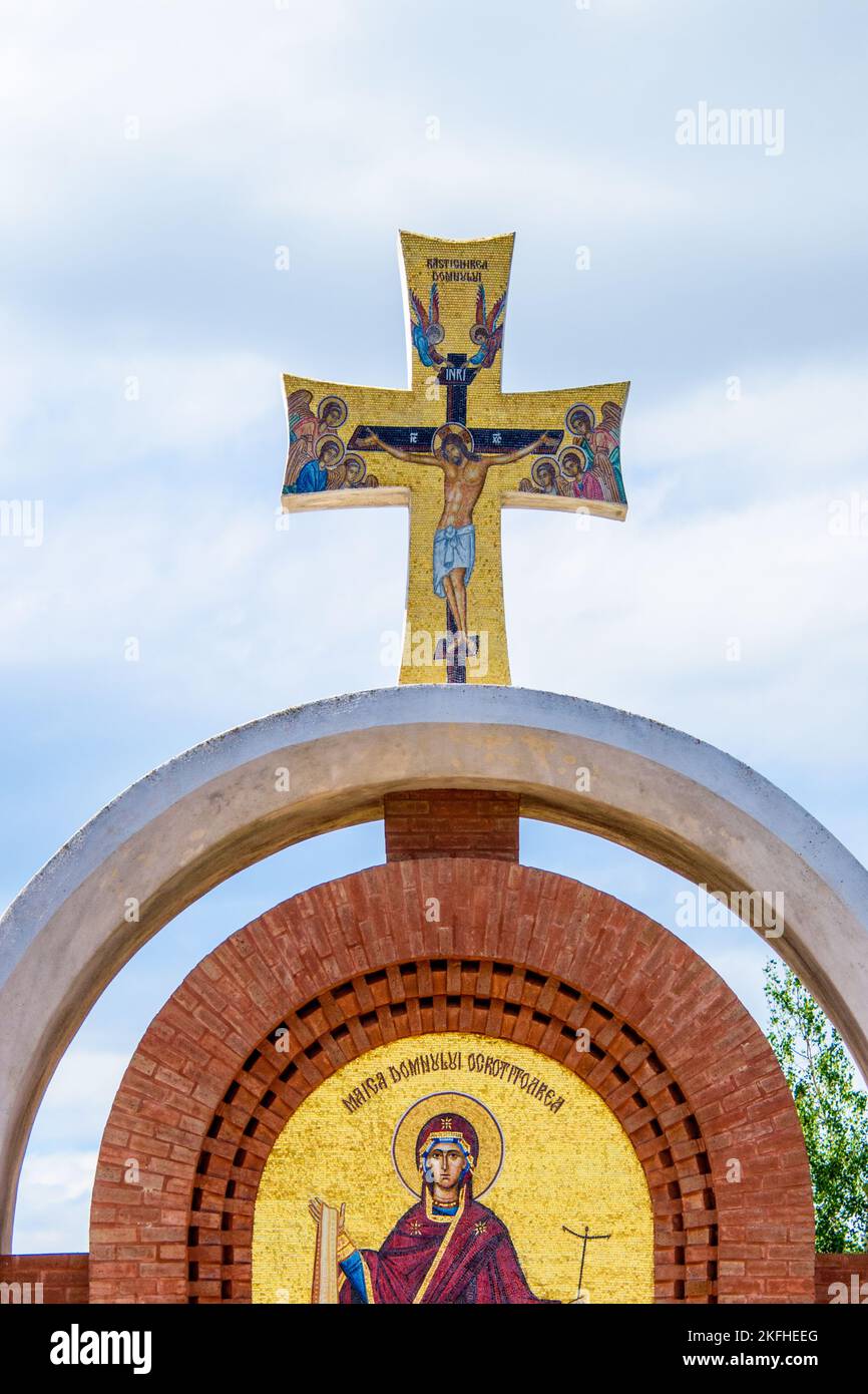 A vertical closeup of a cross with a saint picture in Hadambu orthodox ...