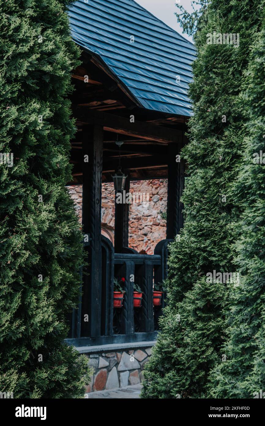 A vertical shot of the exterior and details of Hadambu Monastery in ...
