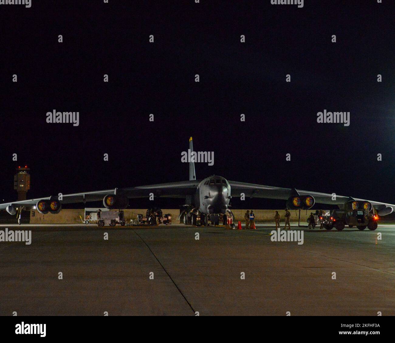 A B-52H Stratofortress is loaded with AGM-86B Air-Launch Cruise ...