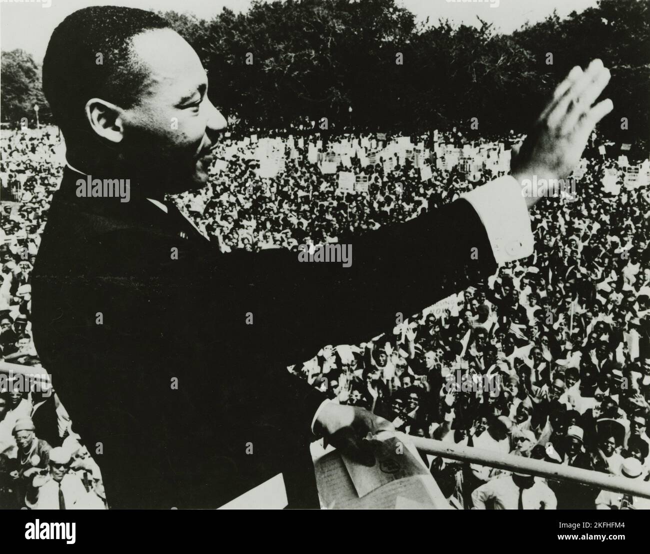Dr. Martin Luther King, Jr. waving to the crowd from the steps of the ...