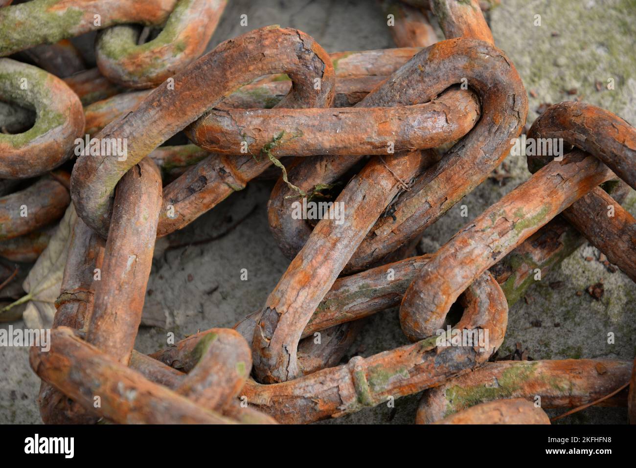 Rustic colourful close up picture of metal chain links connected ...