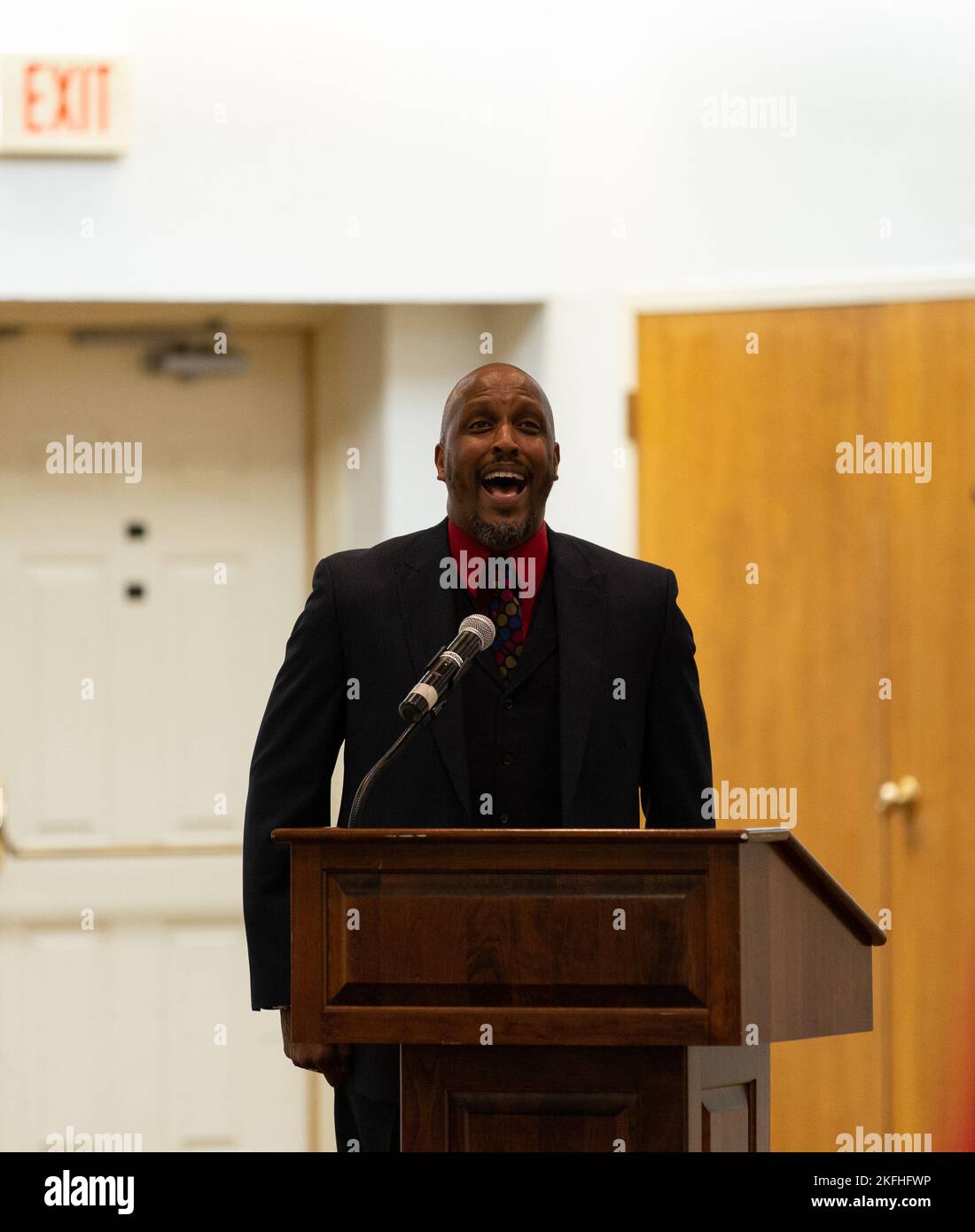 Retired Master Sgt. Robert Burns sings the national anthem at the ...