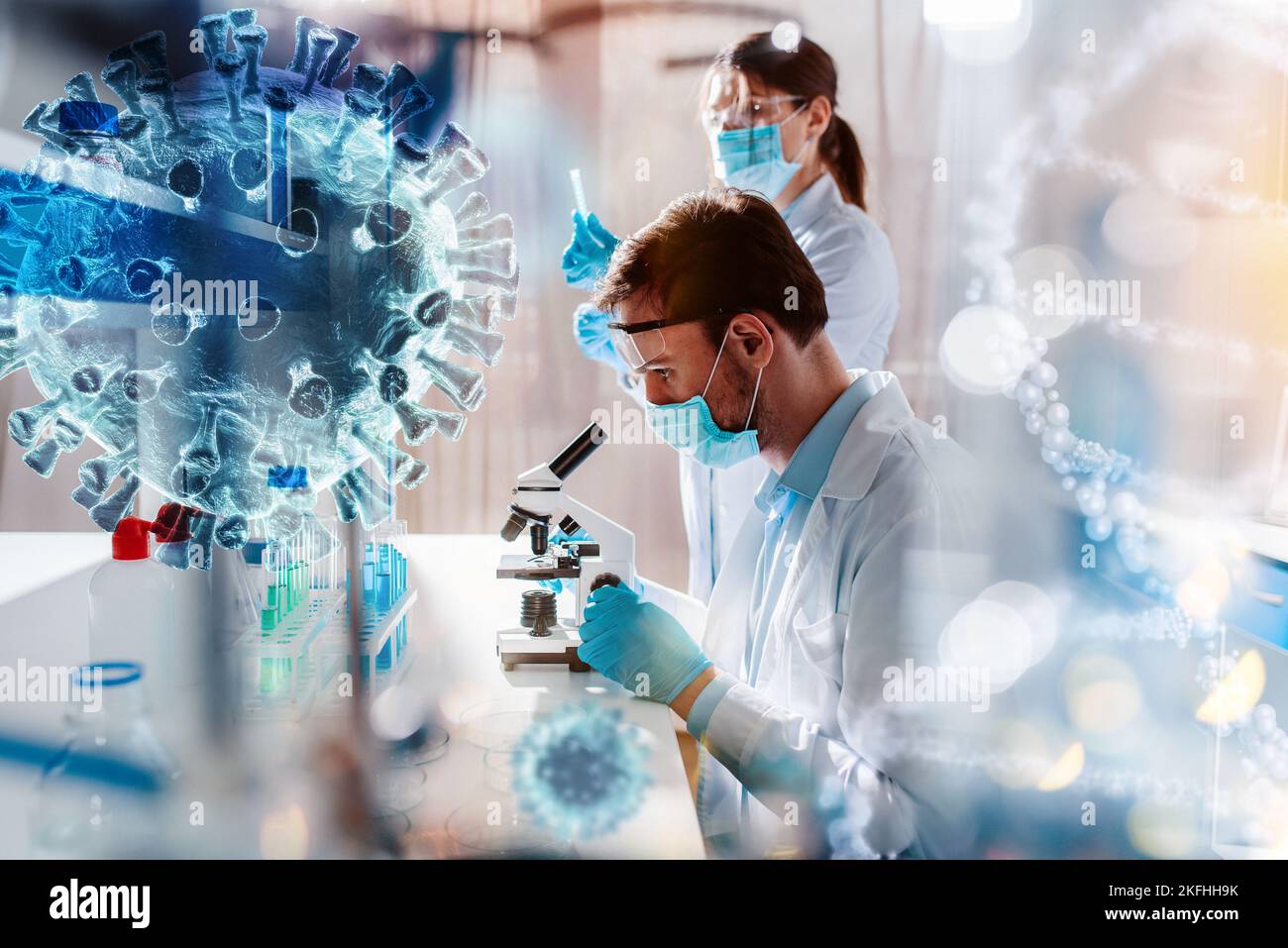 Doctor in the laboratory analyzes samples of codiv-9 under a microscope ...