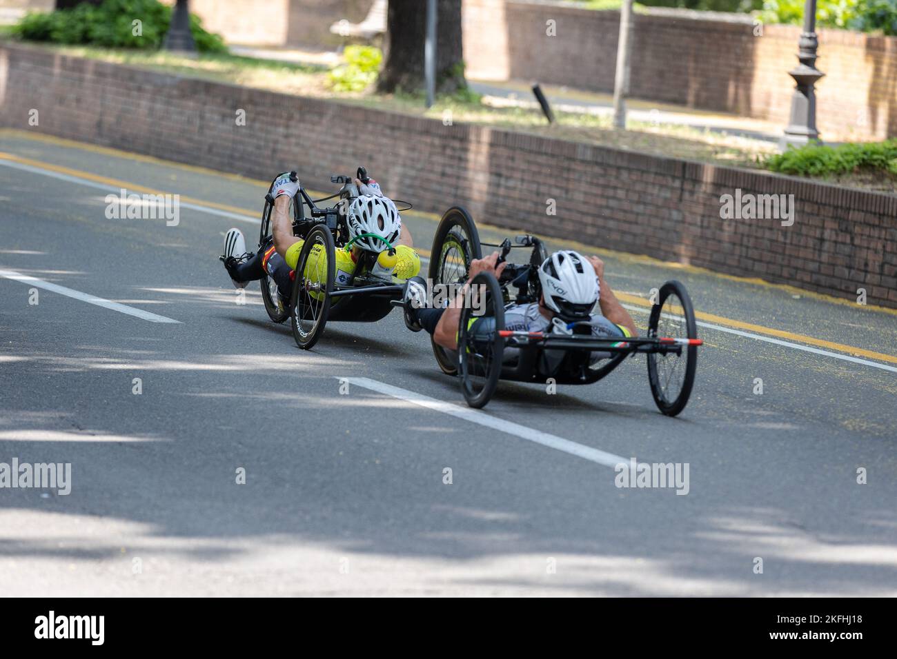 Couple of Athletes training with Their Special Bikes on a City Track ...