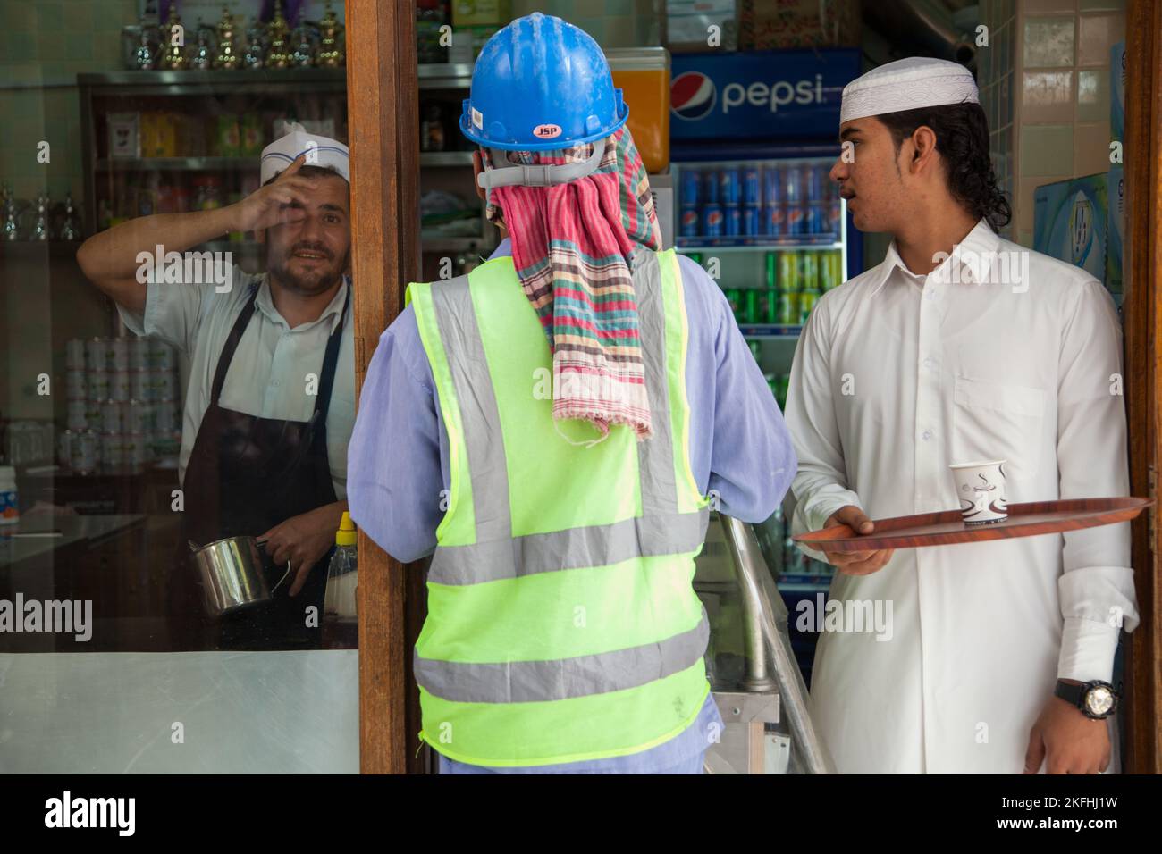 Doha, Qatar, December 18,2019 : Foreign construction workers on the ...