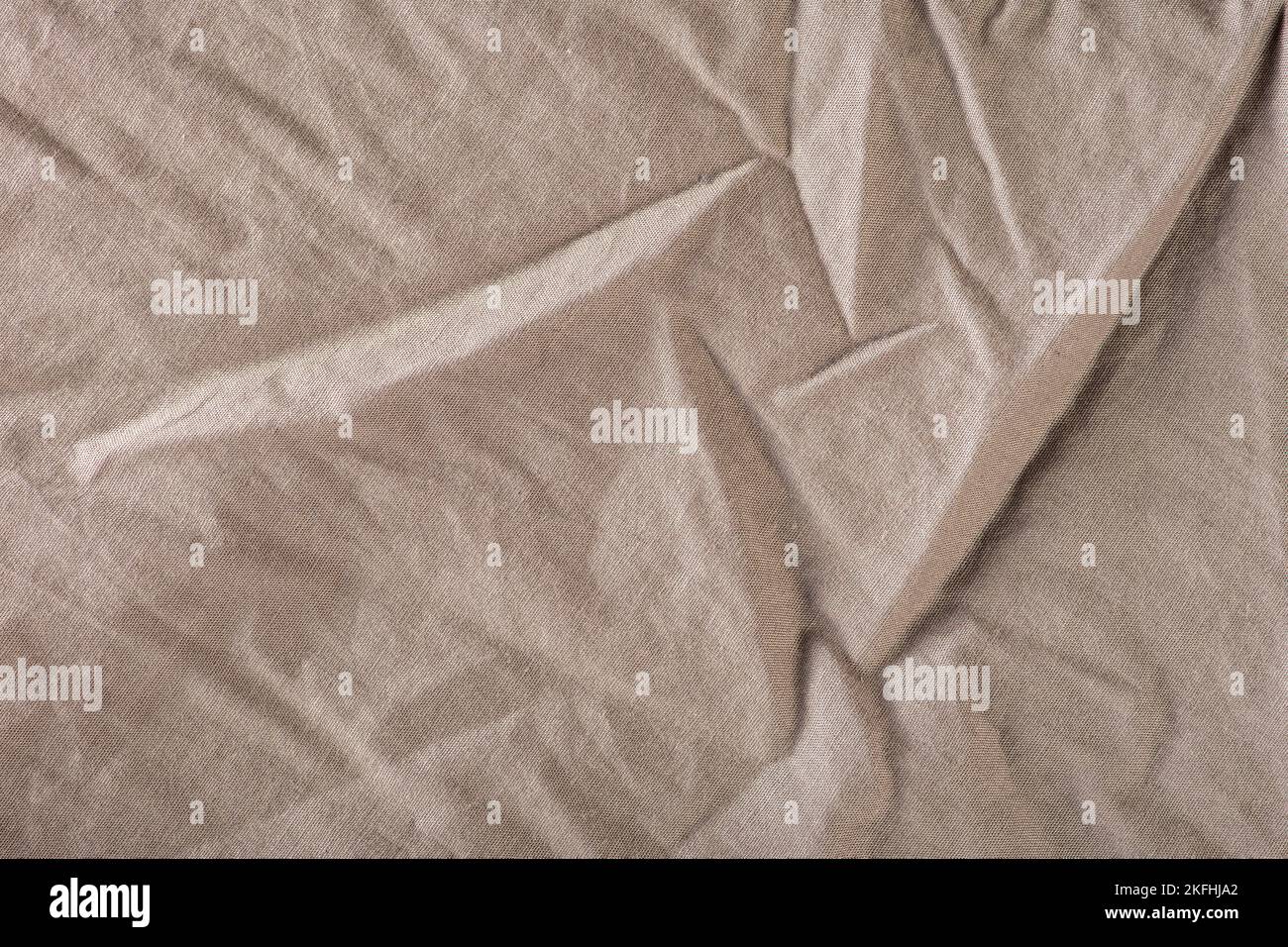 The texture of the crumpled fabric is dark gray. Gray fabric with large ...