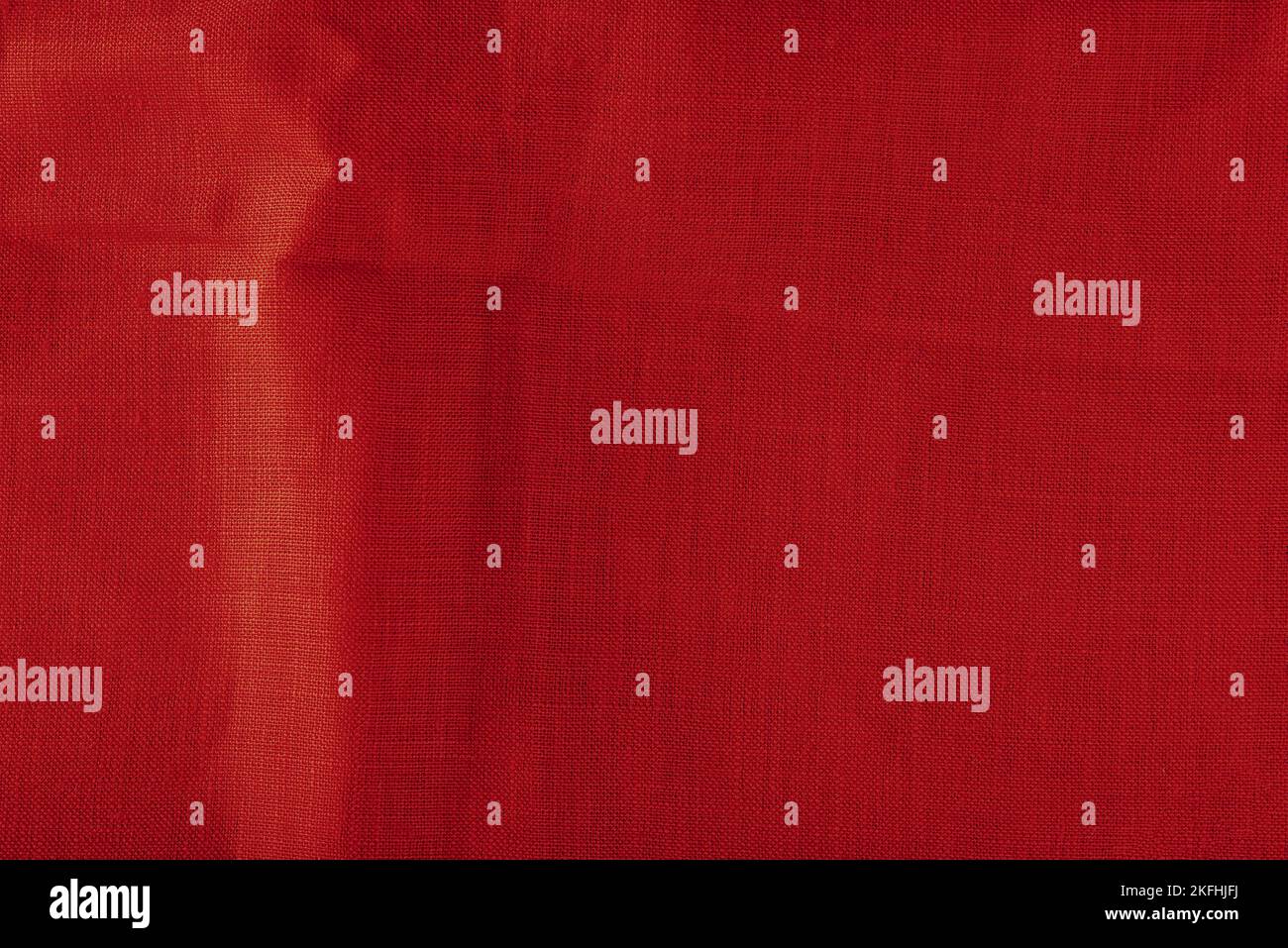 Red linen fabric. Texture of crumpled linen fabric in folds close-up ...