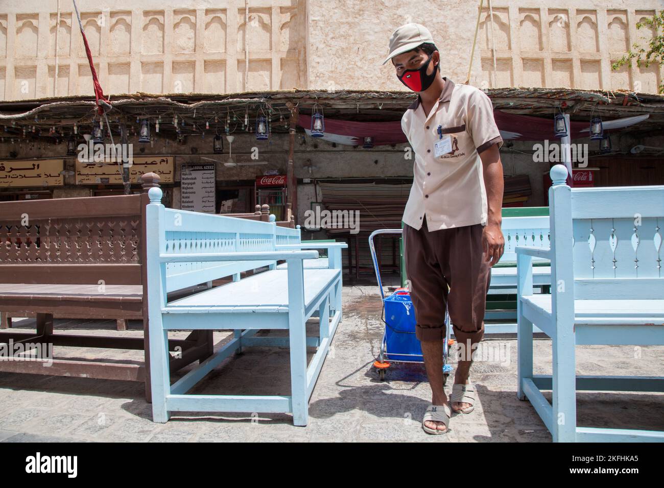 Doha, Qatar, December 18,2019 : Street cleaners clean the old market ...