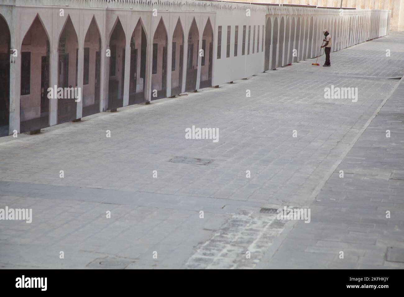 Doha, Qatar, December 18,2019 : Street cleaners clean the old market ...