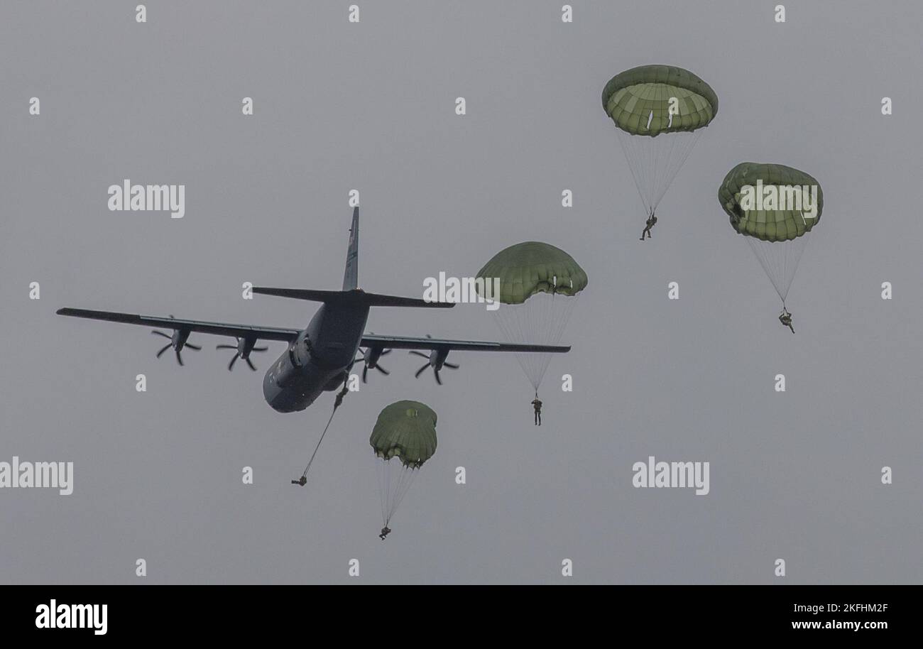A group of U.S. Army and European Paratroopers descends onto the Drop ...