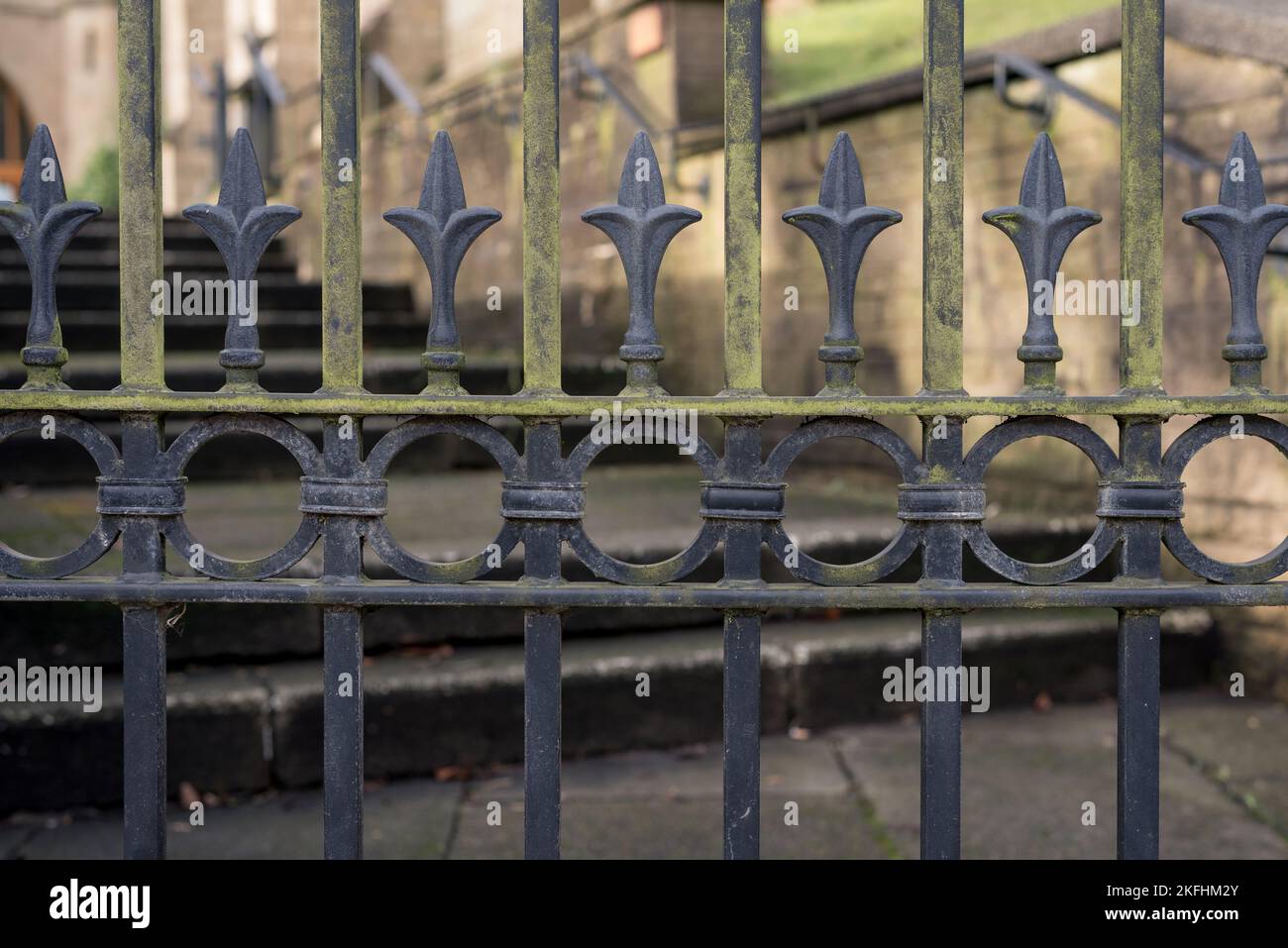 Wrought iron metal railing with fancy pattern Stock Photo - Alamy