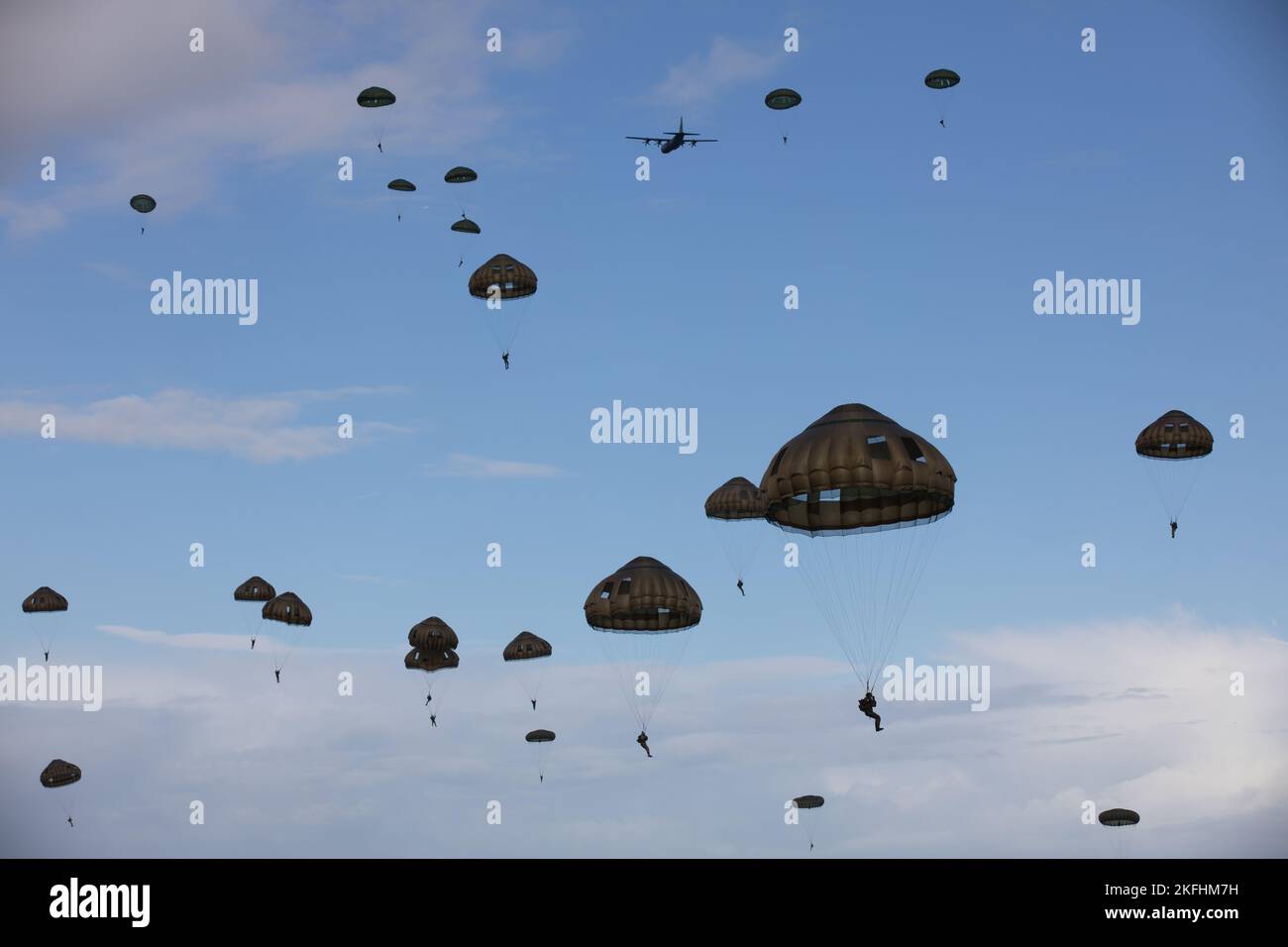 A group of U.S. Army and European Paratroopers descends onto the Drop ...