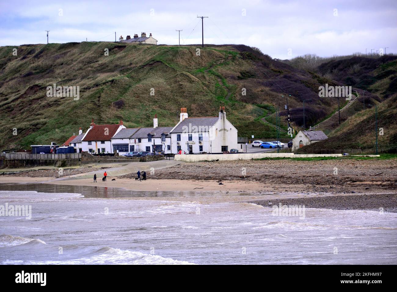 The Ship Inn, which originally dates from the 1500's, and beach at ...