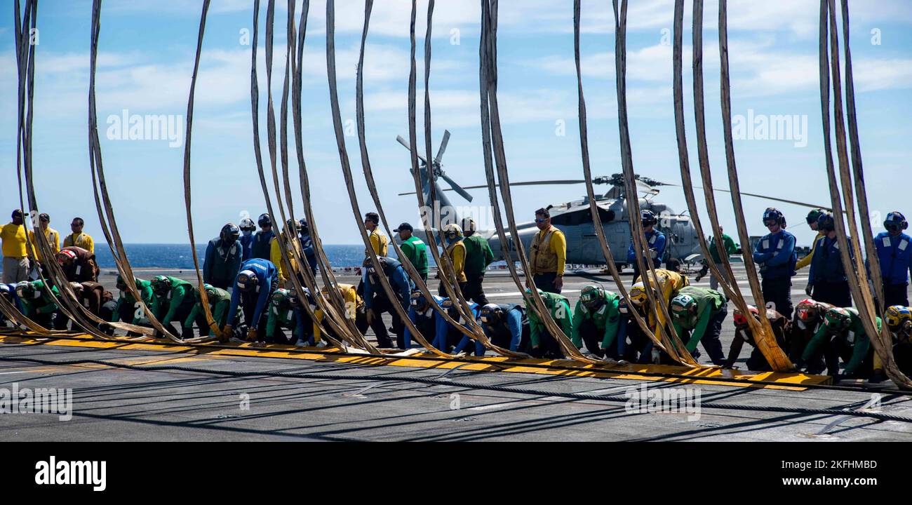 220917-N-DW158-1055 PACIFIC OCEAN (Sept. 17, 2022) Sailors set up a ...