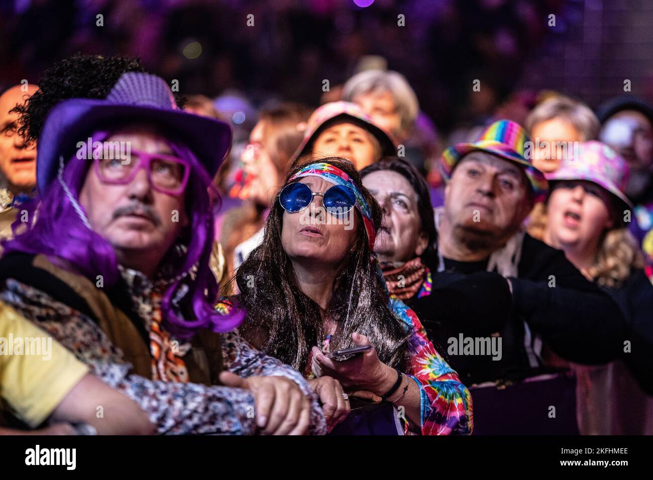 AMSTERDAM - Audience in flower power outfit as theme during a ...