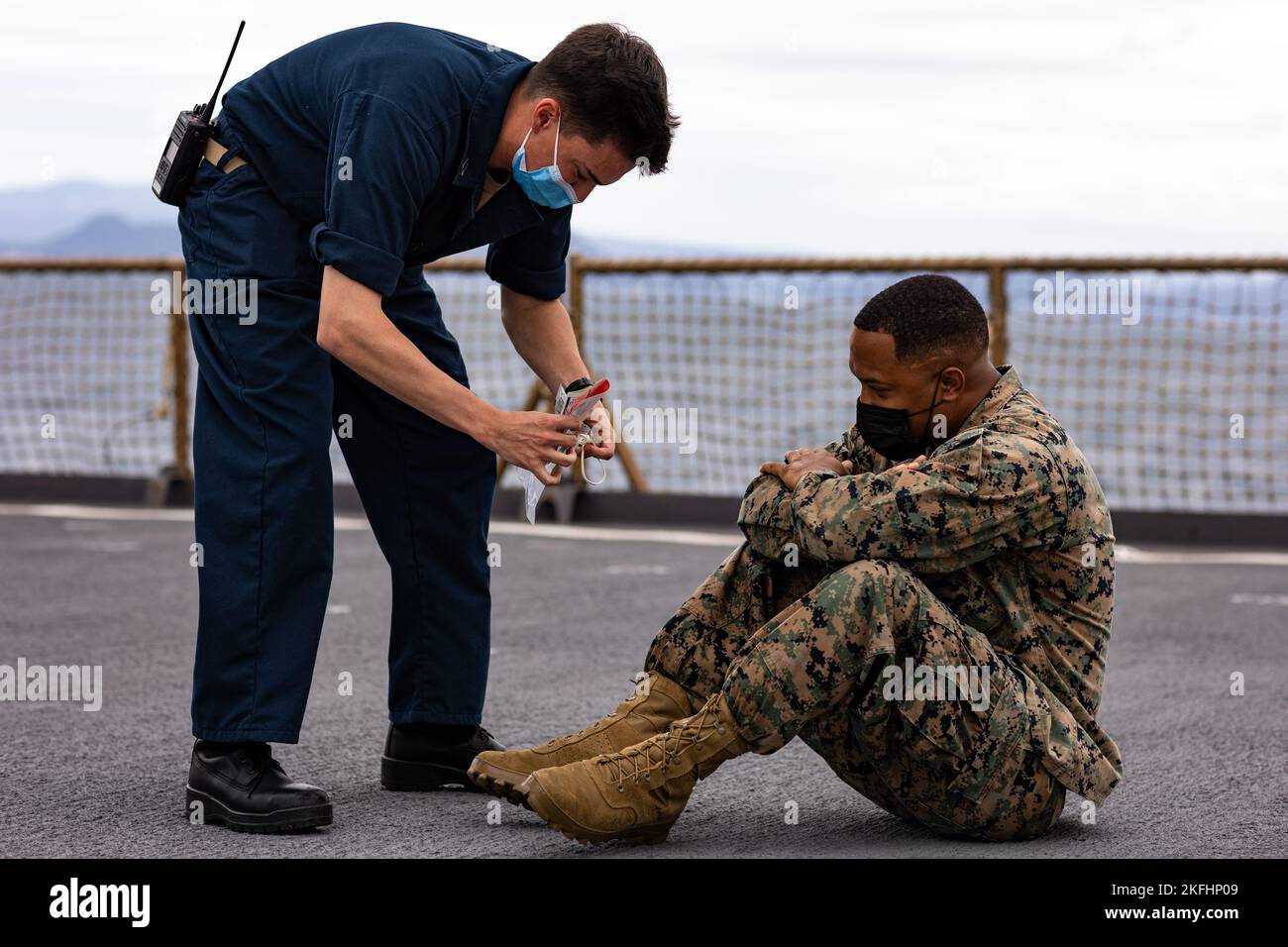 U.S. Navy Lt. Ransom Gray, dental officer aboard the amphibious dock ...