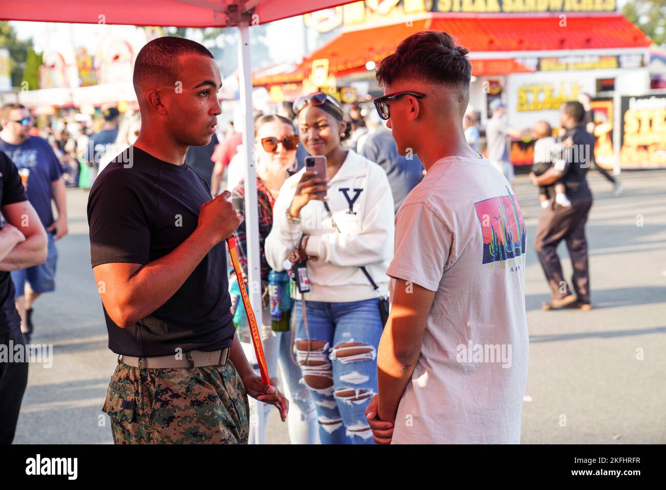 U.S. Marine Corps Pfc. Nathan Mercado, left, an aviation mechanic on ...