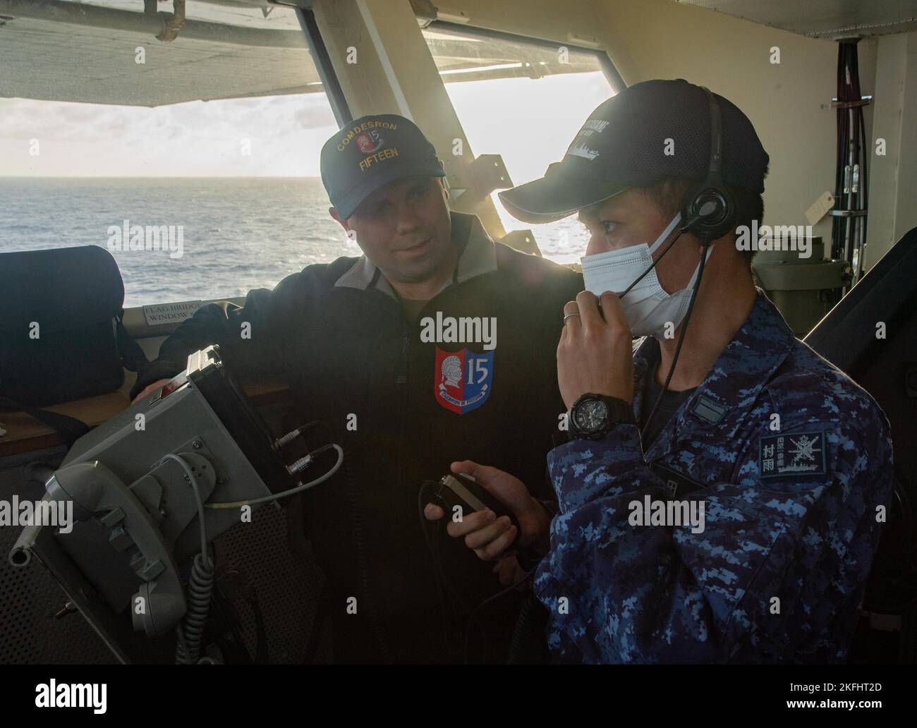 PHILIPPINE SEA (Sept. 17, 2022) Sailors from Destroyer Squadron (DESRON) 15, left, and Japan ...