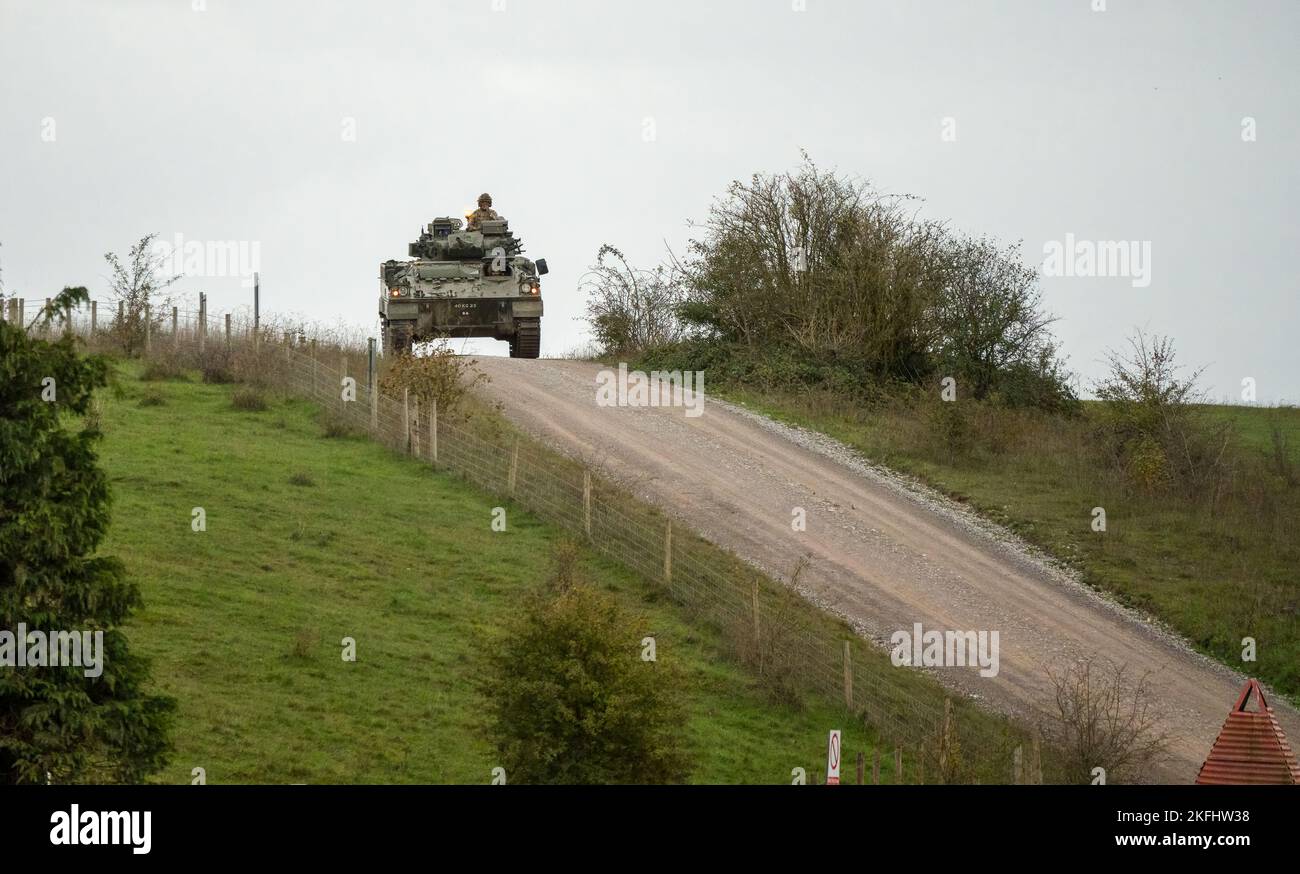 British army Warrior FV510 Fighting Vehicle in action driving on a mud ...