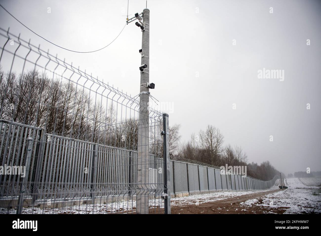 A view of the surveillance cameras on a pole of the electronic barrier ...