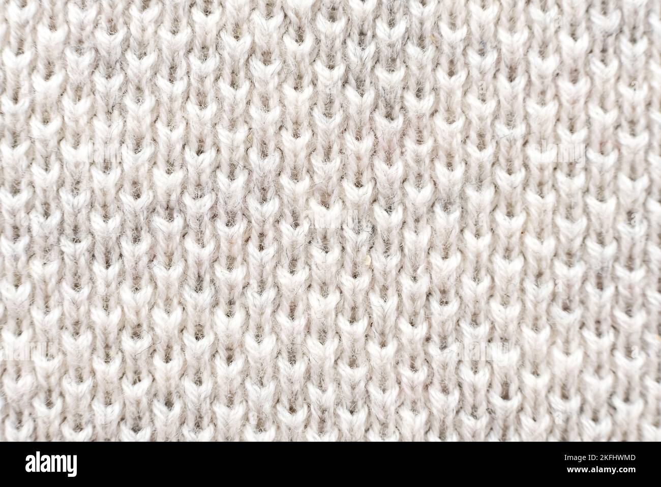 White natural texture of knitted wool textile material background ...