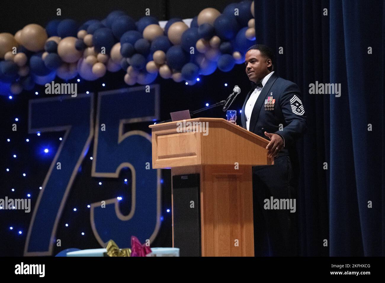 Chief Master Sgt. Jerry Dunn, 374th Airlift Wing command chief, gives ...