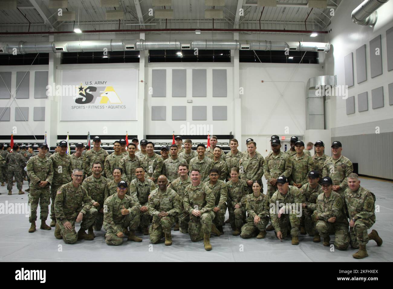 Badge recipients and EFMB Cadre pose together for a picture after the ...