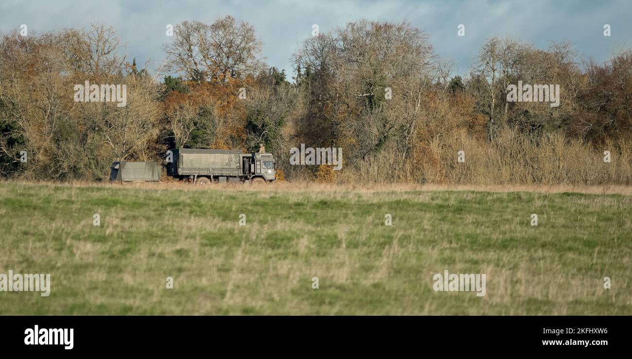 British army MAN SV 4x4 logistics truck with armed rooftop soldier in ...