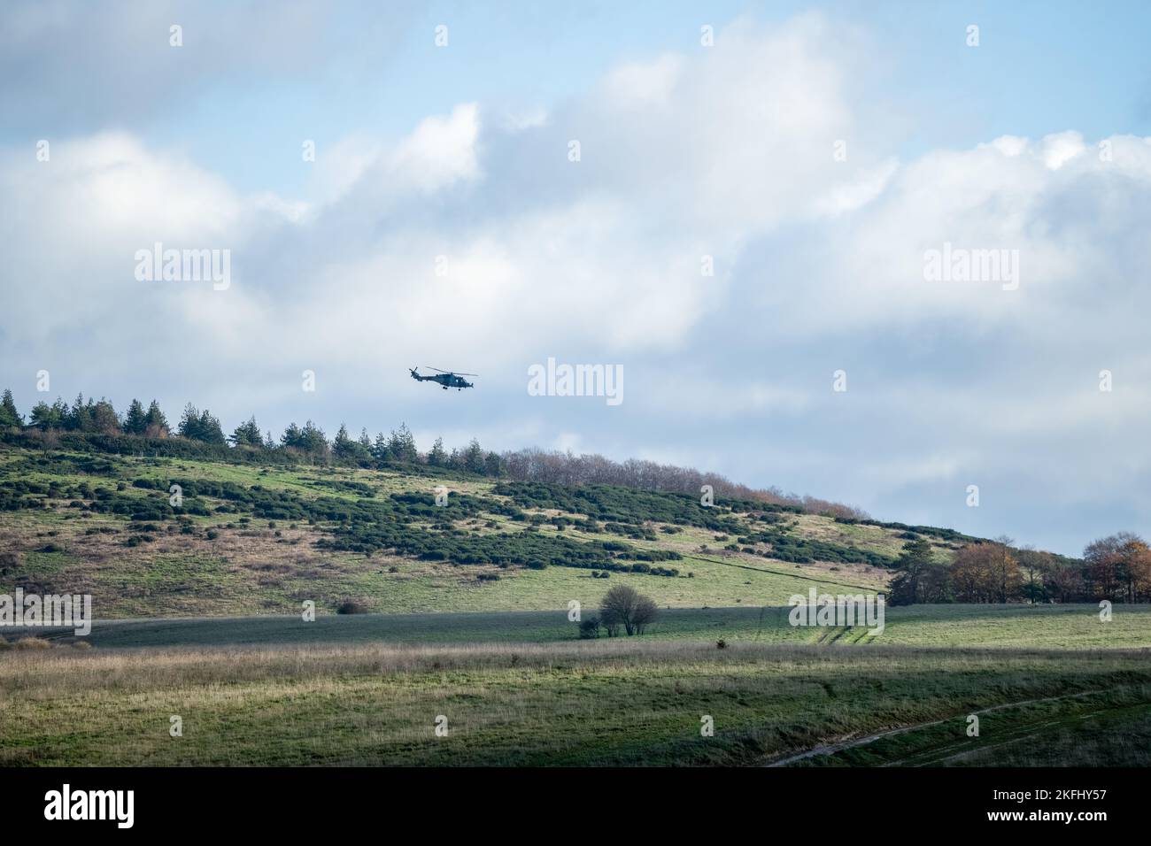 British army AgustaWestland AW159 Wildcat AH1 helicopter flying low ...