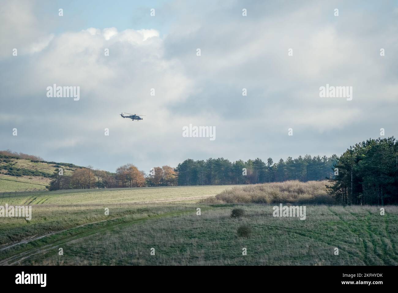 British army AgustaWestland AW159 Wildcat AH1 helicopter flying low ...