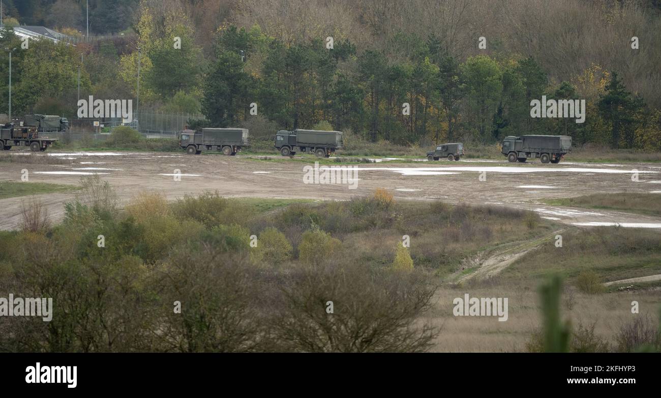 convoy of British army Heavy Utility Trucks returning to a base Stock ...