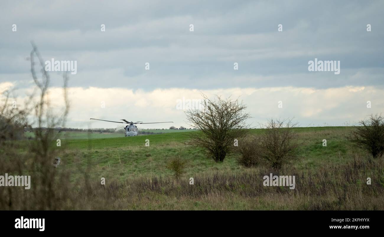 British army AgustaWestland AW159 Wildcat AH1 helicopter flying low ...