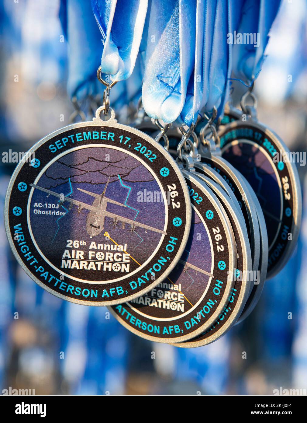 Medals for the 2022 Air Force Marathon hang on display at the race’s ...