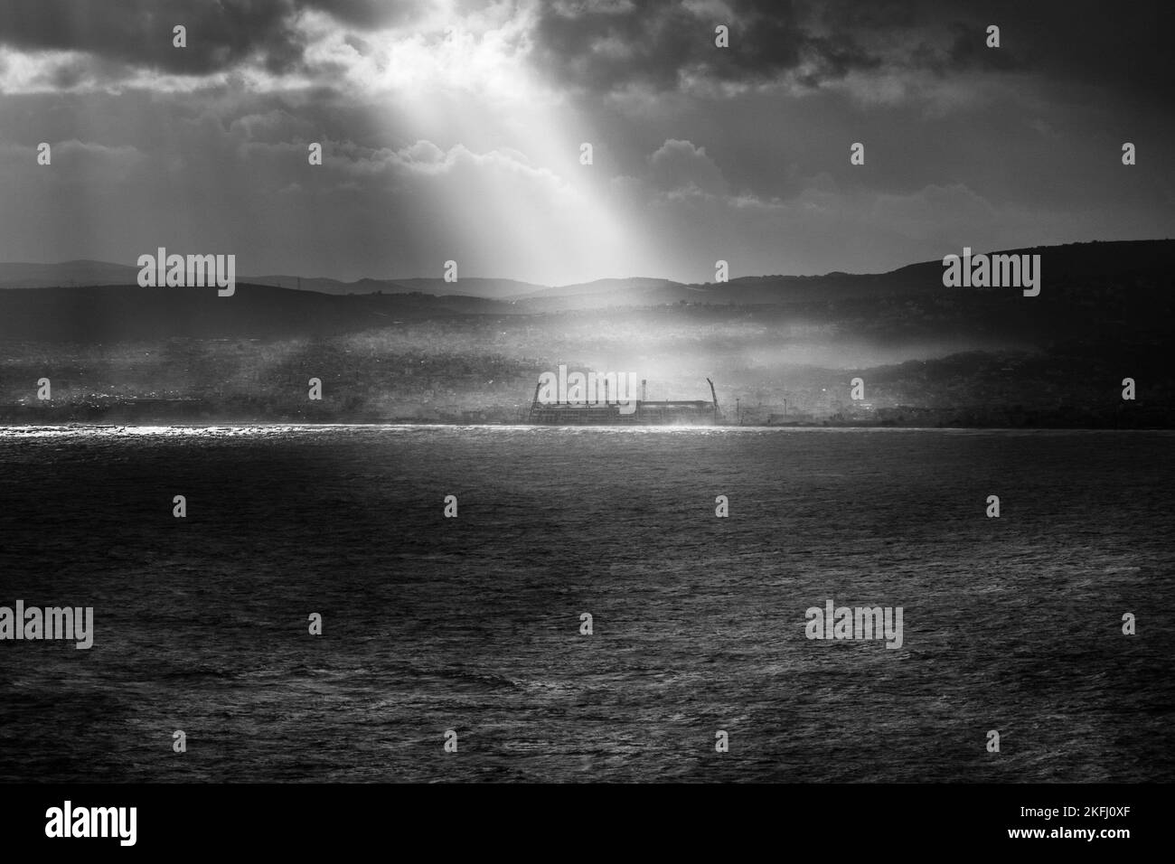 Waterfront with sunbeam mountain Black and White Stock Photos & Images ...