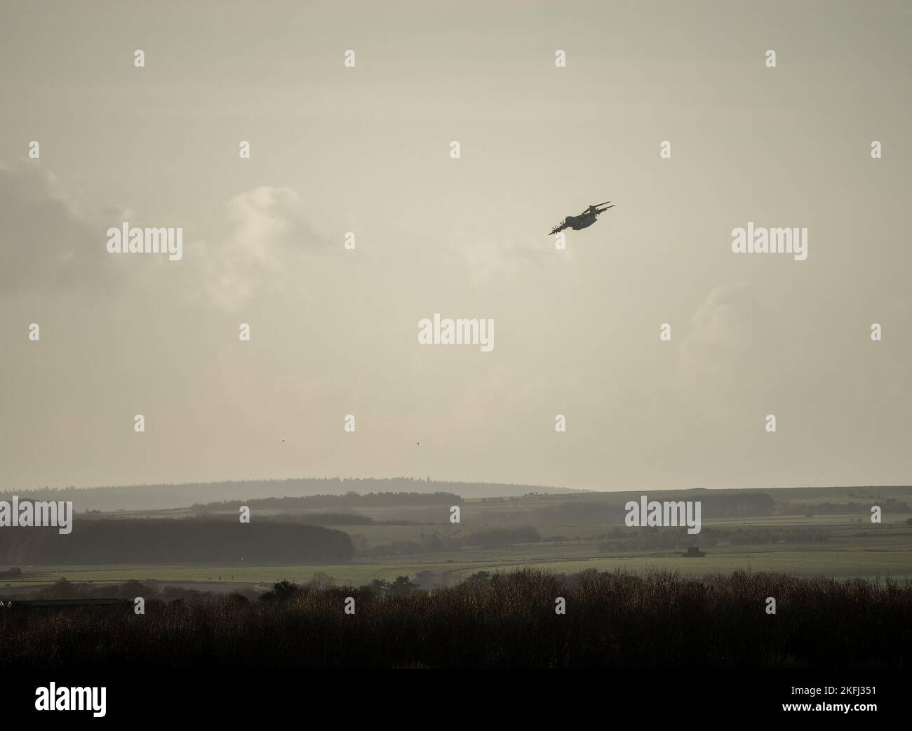 a royal air force Atlas A400M military cargo plane on a parachute drop ...
