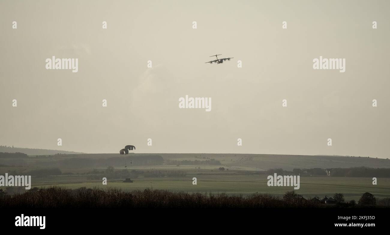 a royal air force Atlas A400M military cargo plane on a parachute drop ...