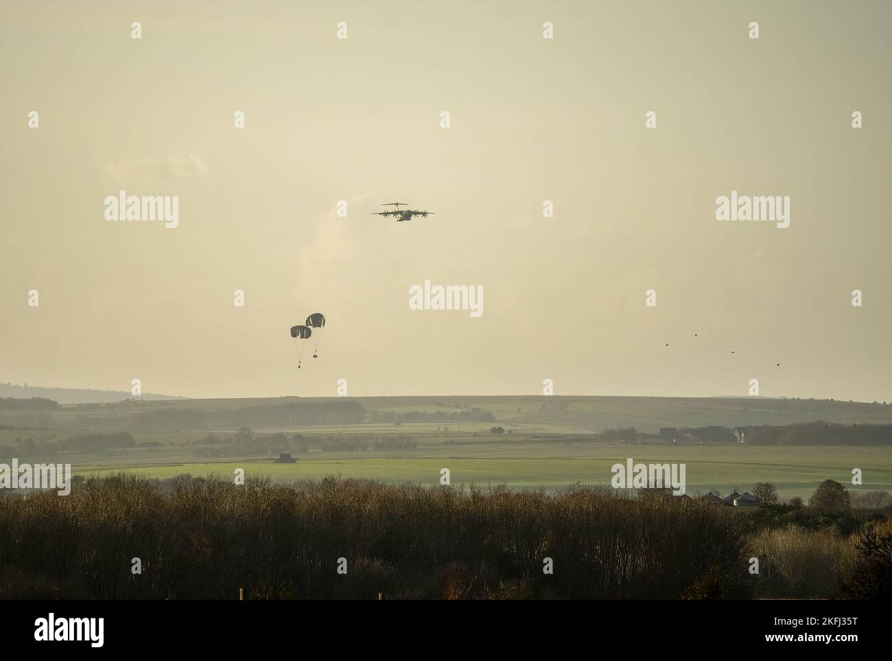 a royal air force Atlas A400M military cargo plane on a parachute drop ...