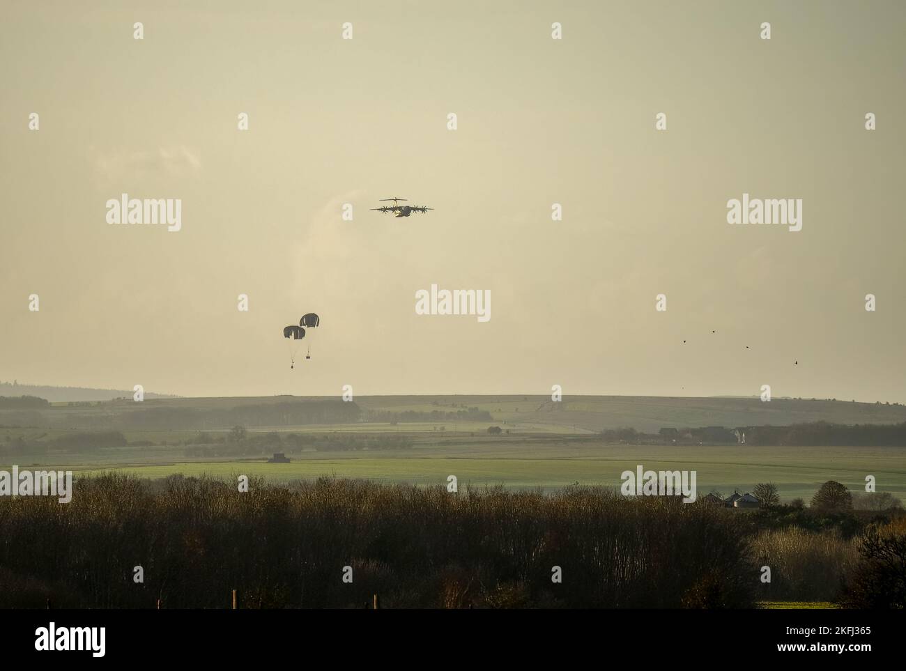 a royal air force Atlas A400M military cargo plane on a parachute drop ...
