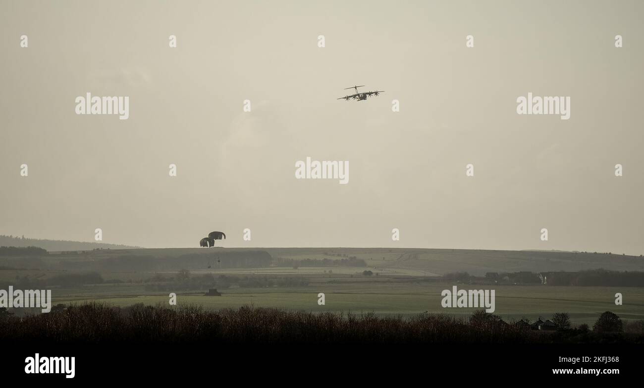 a royal air force Atlas A400M military cargo plane on a parachute drop ...