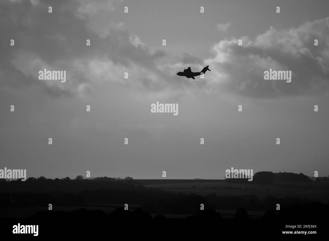 a royal air force Atlas A400M military cargo plane on a parachute drop ...