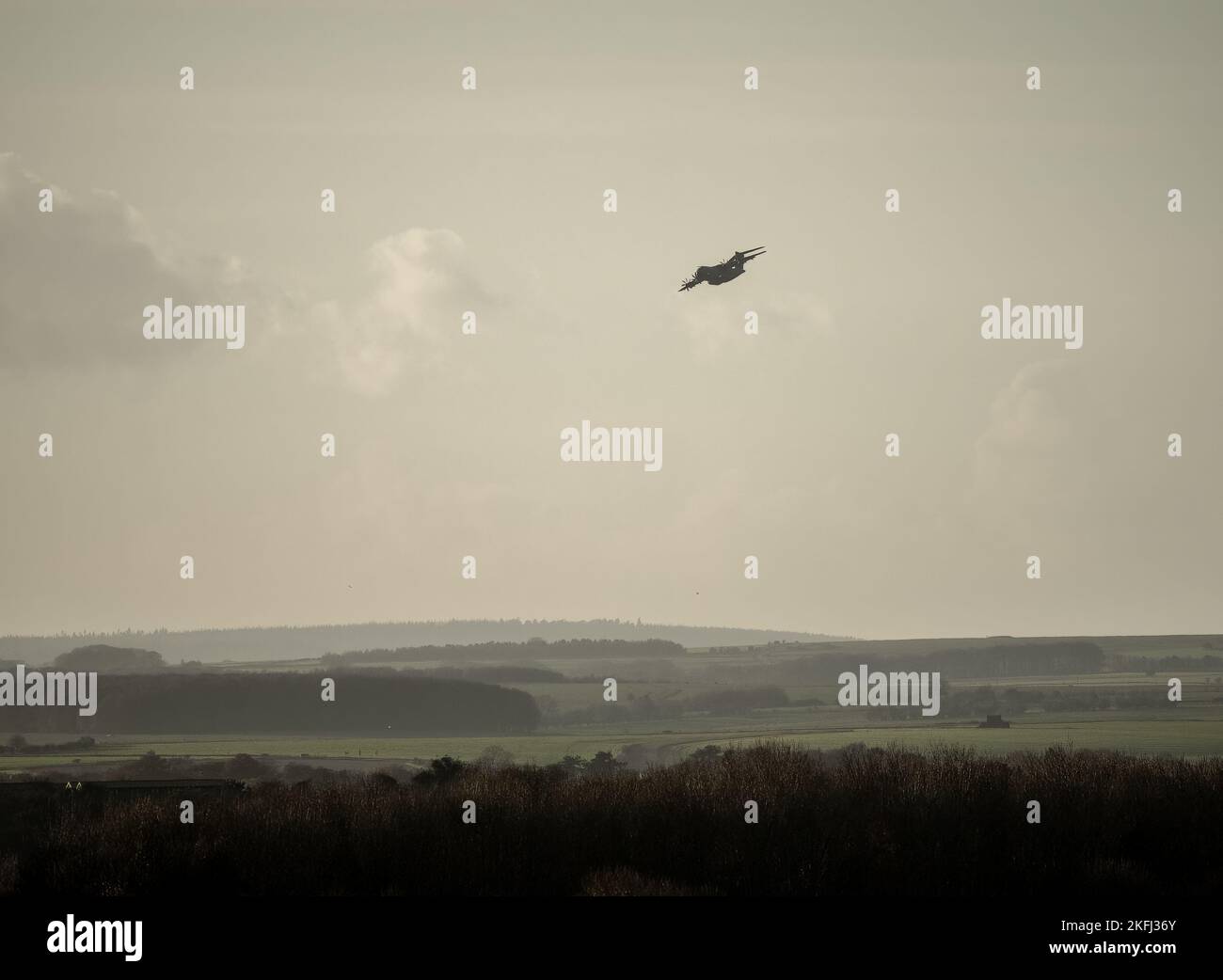 a royal air force Atlas A400M military cargo plane on a parachute drop ...