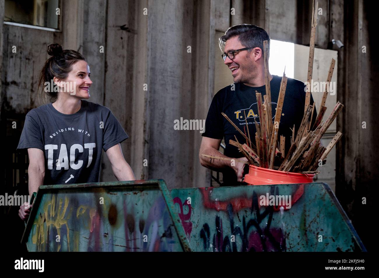 Becky Mershon, left, the COO of Teaching the Autism Community and Senior Airman Danny Combs, 4th ...