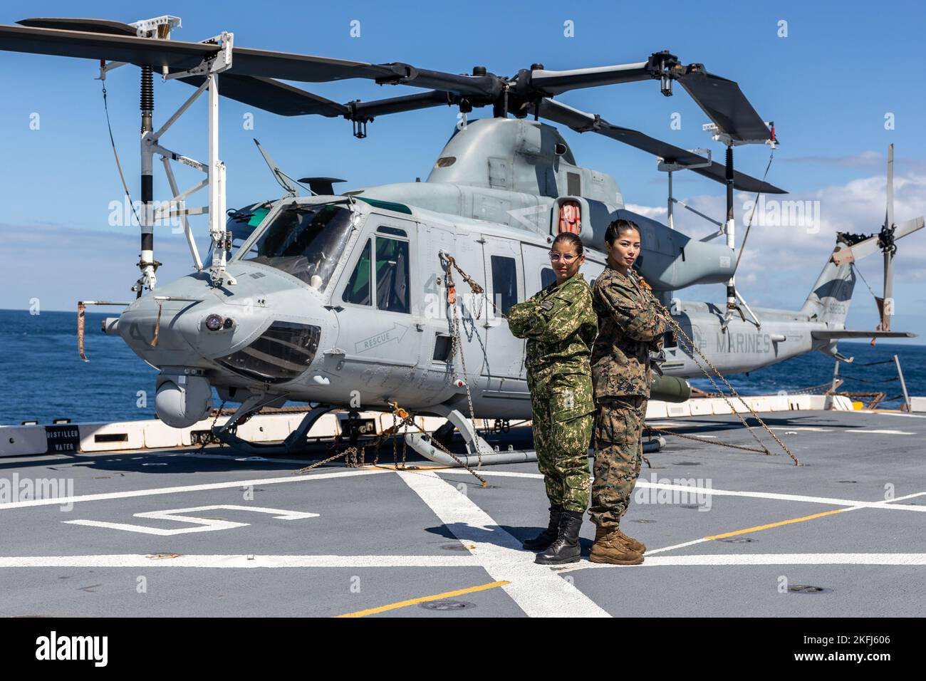 U.S. Marine Corps Lance Cpl. Charisse Briguera, right, a rifle Marine ...