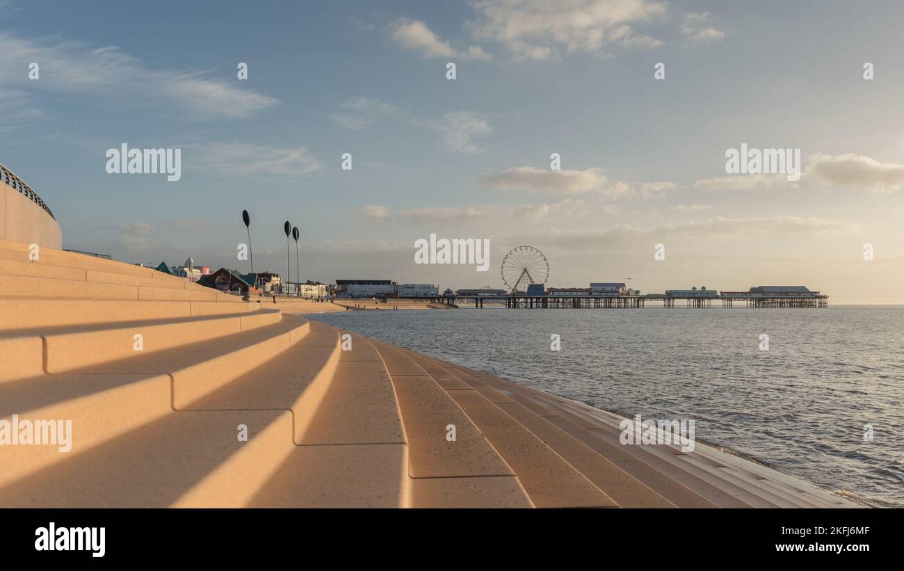 Blackpool promenade, new front steps to sit on. Golden sunlight Stock ...