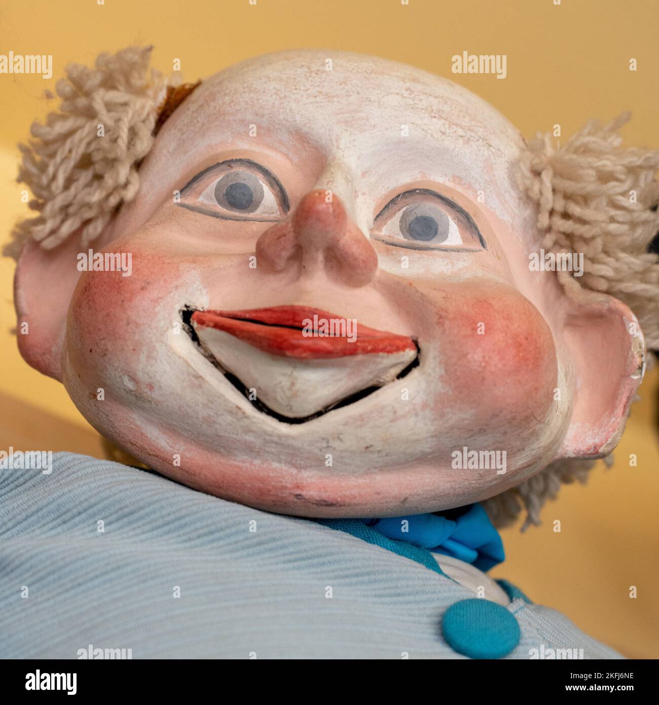 A closeup of a puppet from a puppet theater on yellow background Stock ...