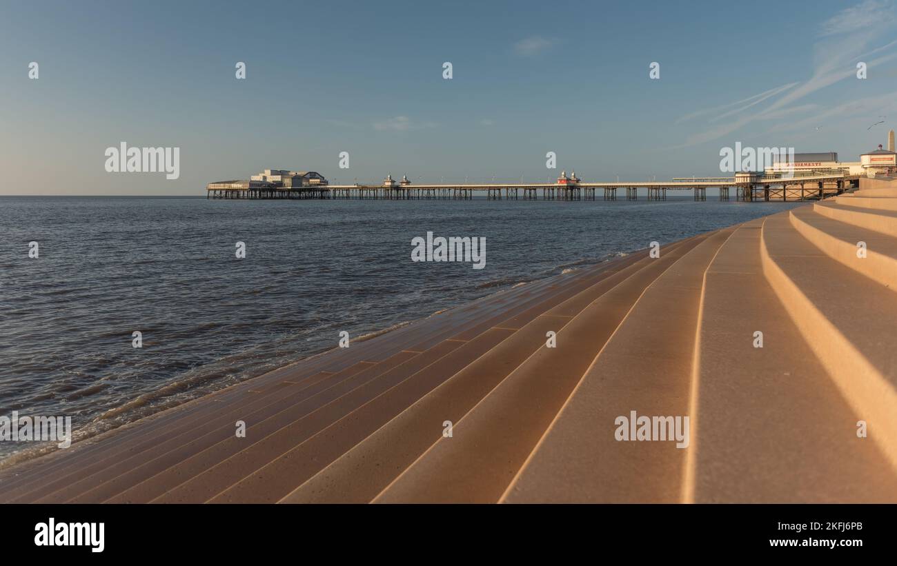 Blackpool promenade, new front steps to sit on. Golden sunlight Stock ...