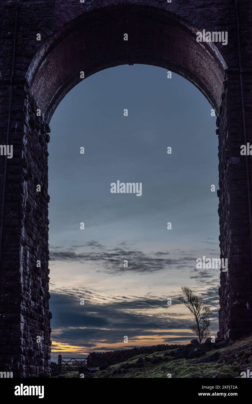 Ribblehead Viaduct section of the bridge. Looking through at sunset ...