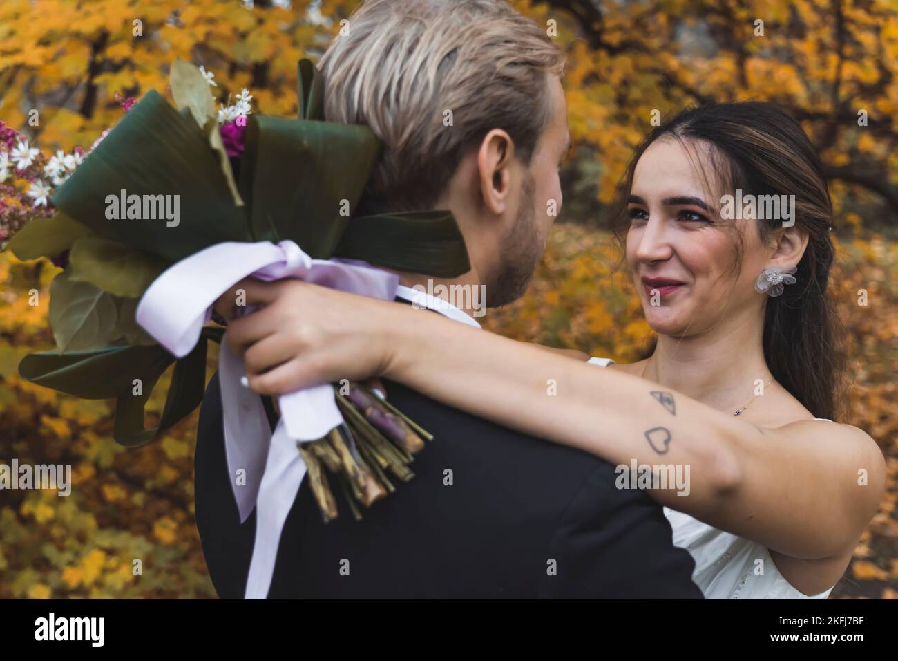 Autumn wedding. Closeup portrait of proud smiling Turkish long-haired ...