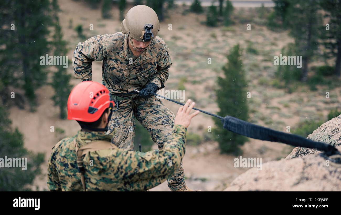 U.S. Marine Corps Sgt. Luis Aragon (Left), a mountain warfare ...