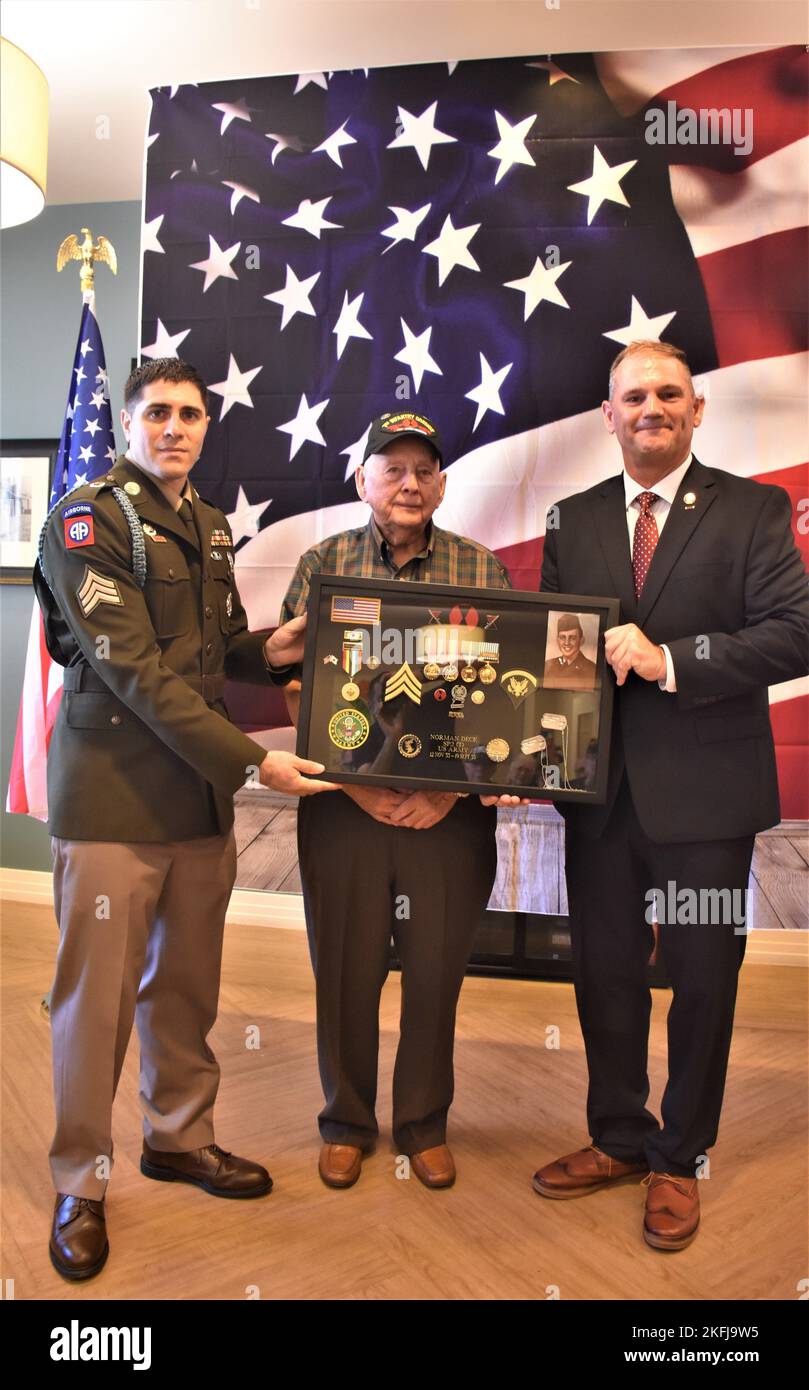 Korean War veteran Sgt. Norman Deck receives a shadow box containing ...